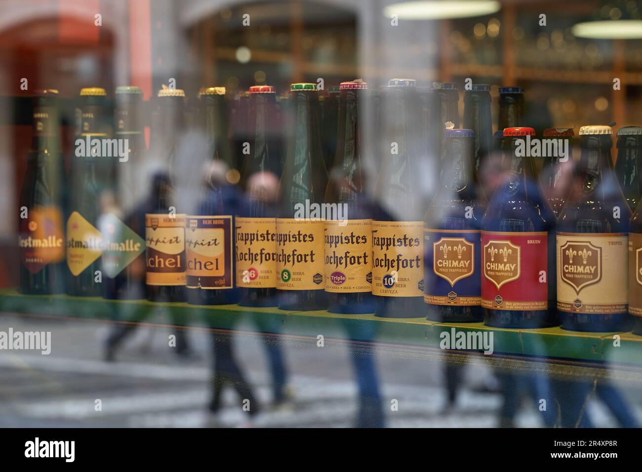 Various bottled authentic Belgian trappist beers displayed on a ...