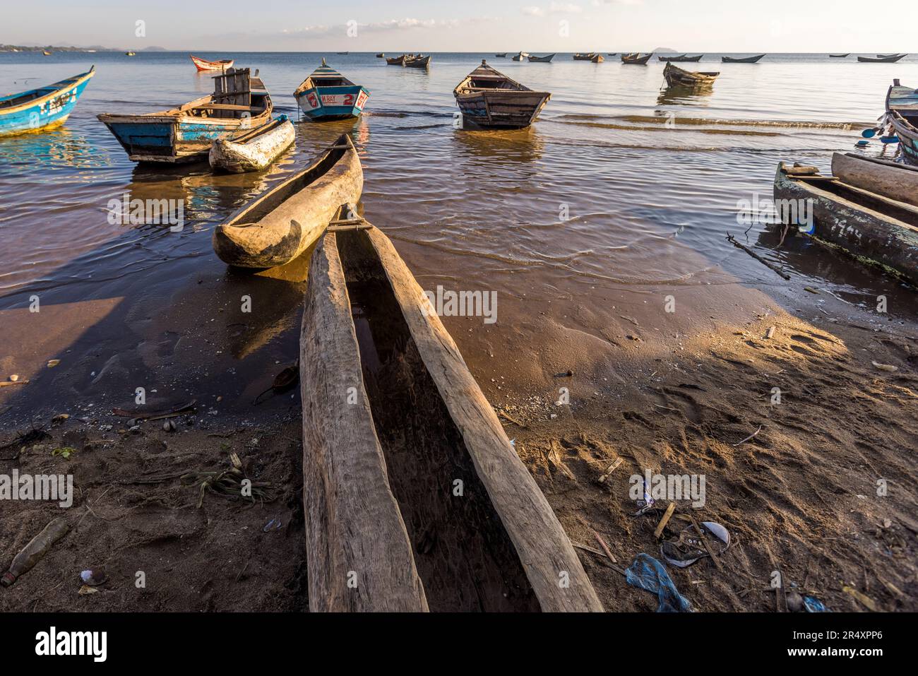 Lake Malawi, small fishing harbor near Makawa with rowboats and dugout ...