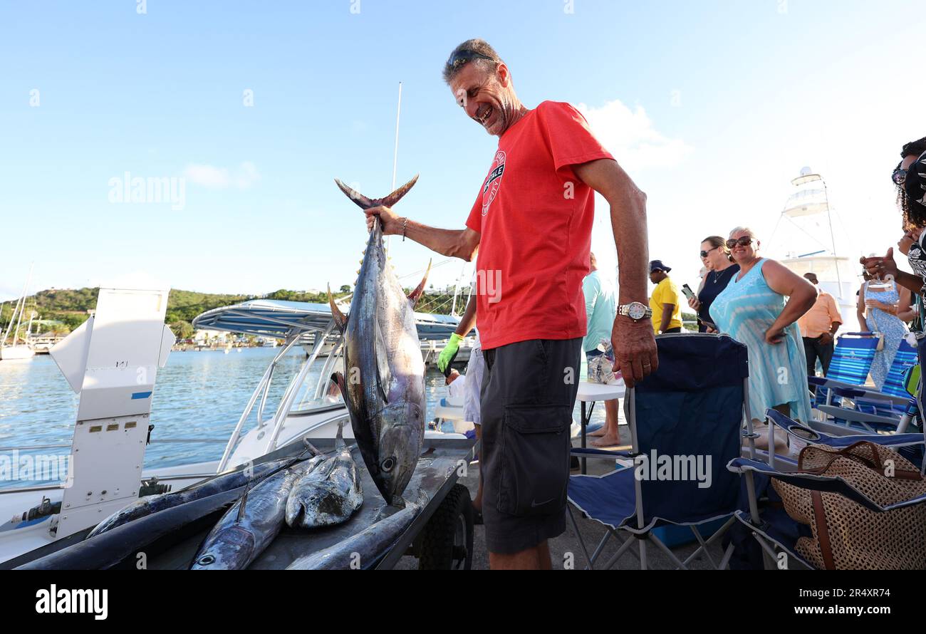 Competitors bring their catch to shore to be weighed on the final day ...