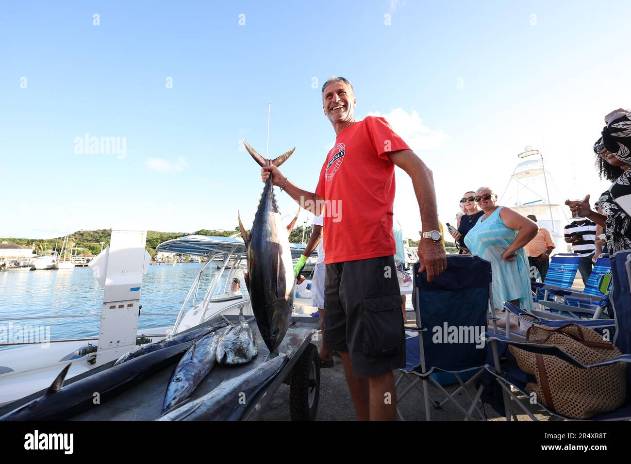 Competitors bring their catch to shore to be weighed on the final day ...