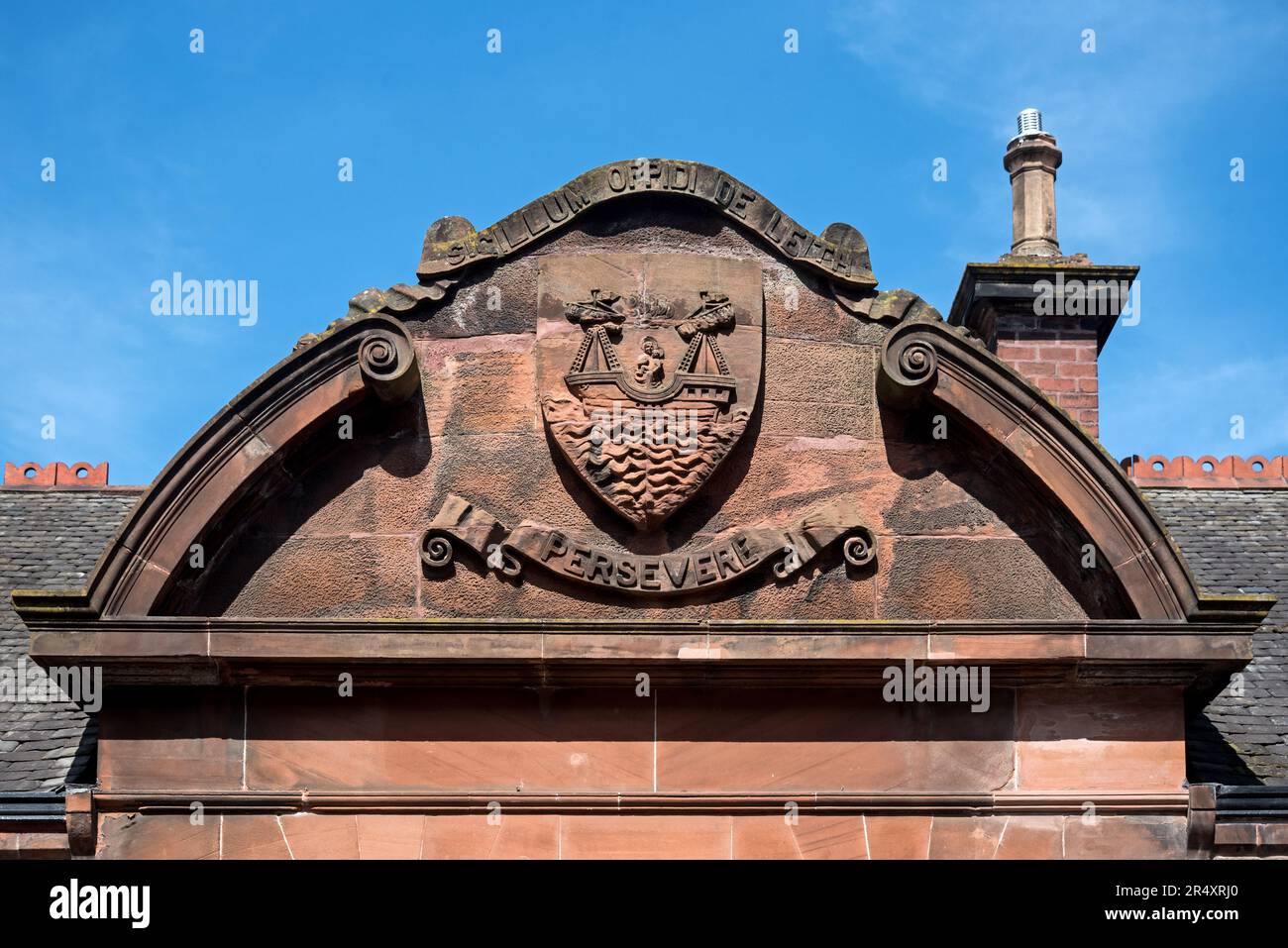 Leith coat of arms and motto on red sandstone on a building in Leith ...