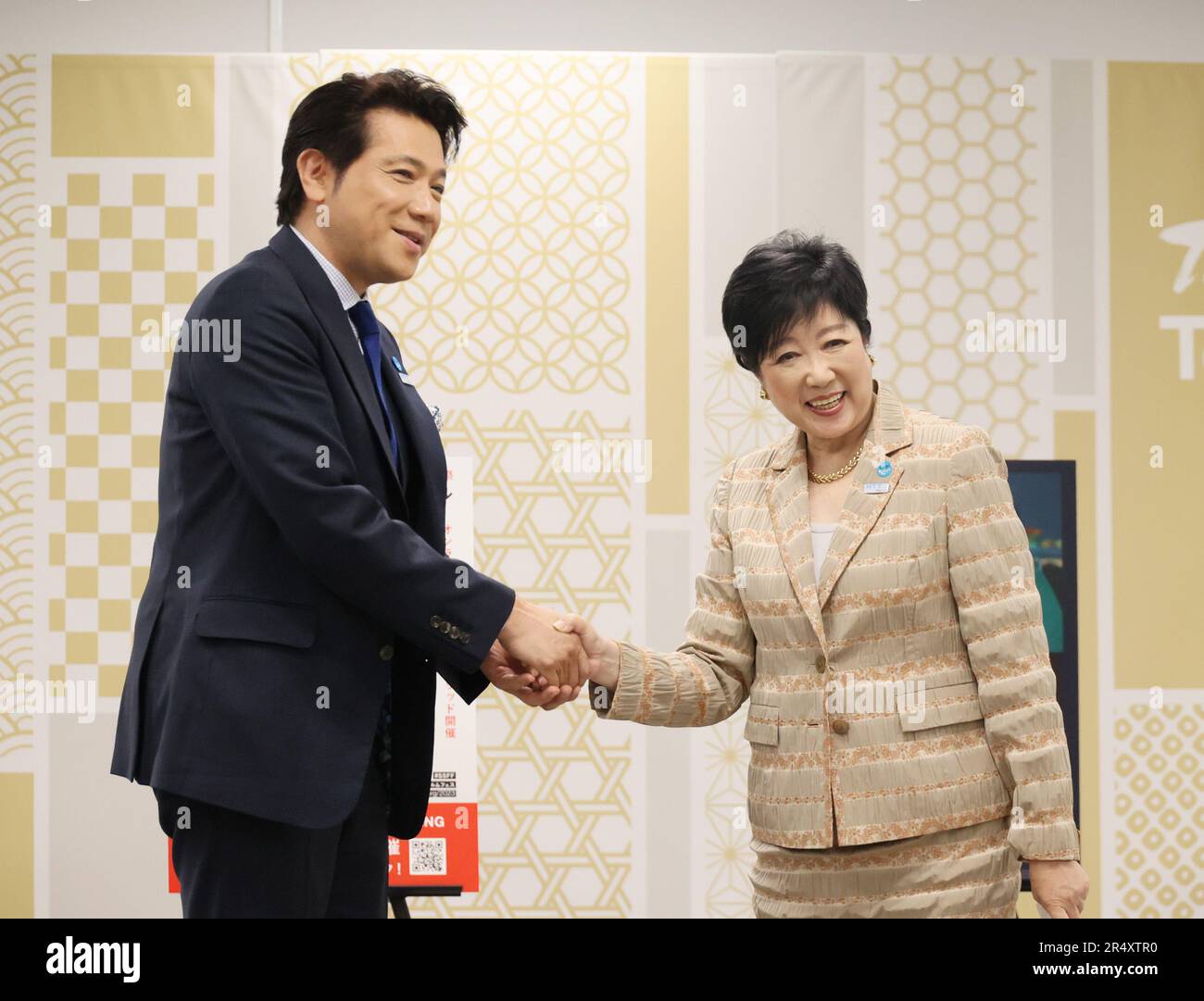 Tokyo, Japan. 30th May, 2023. Japanese actor Tetsuya Bessho (L) shakes ...