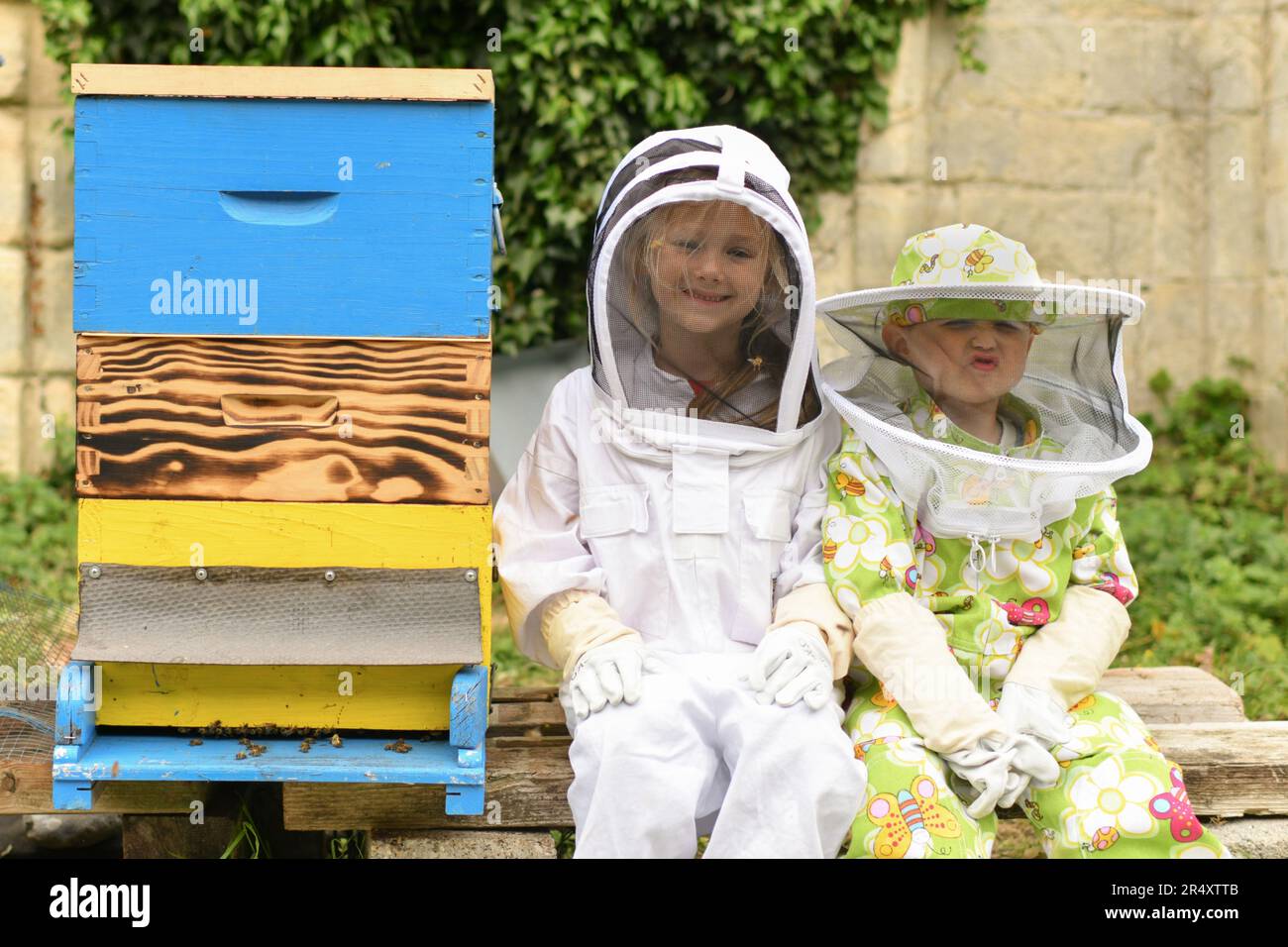 Child bee keeping hi-res stock photography and images - Alamy