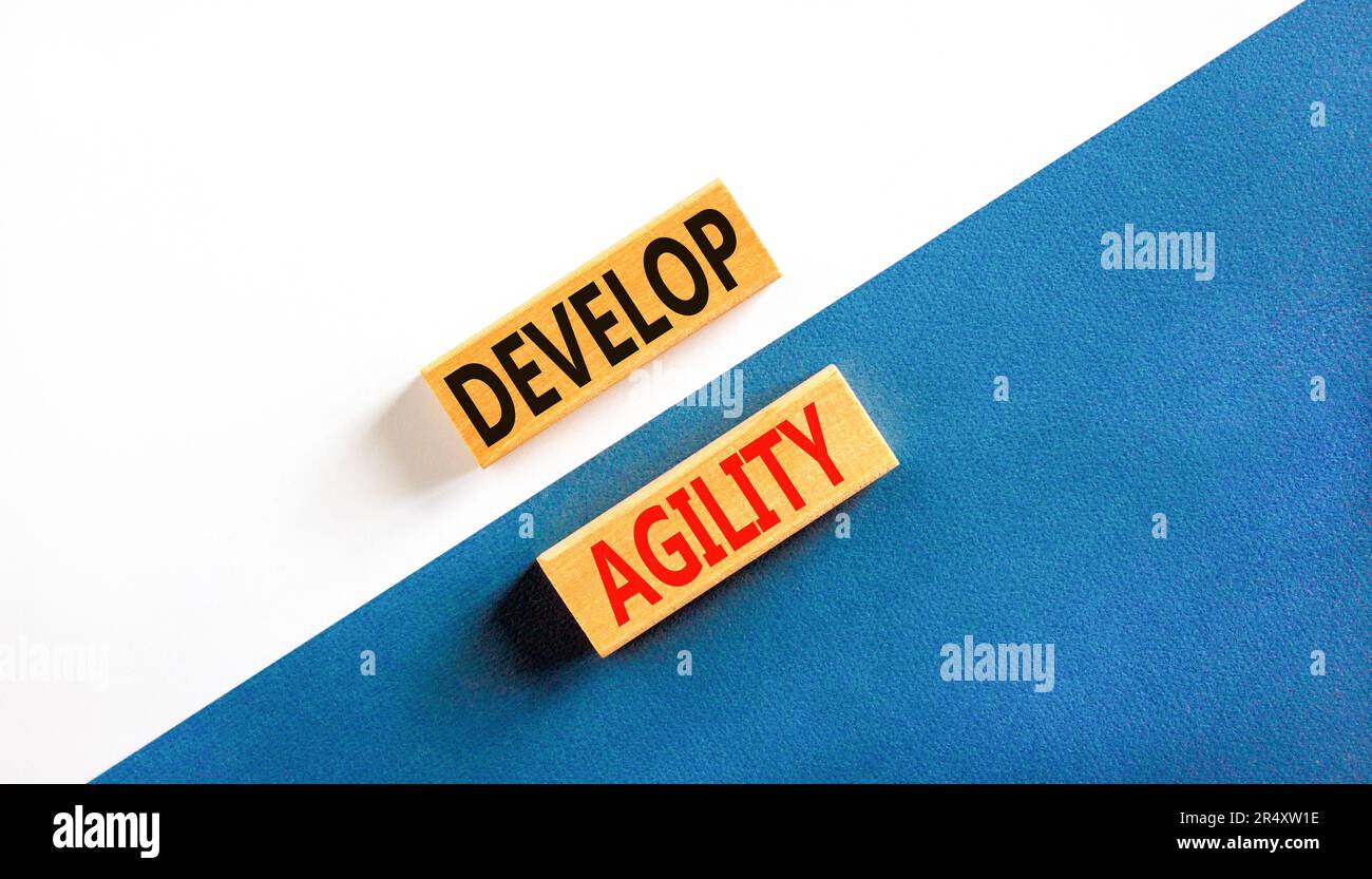 Develop agility symbol. Concept words Develop agility on wooden blocks ...