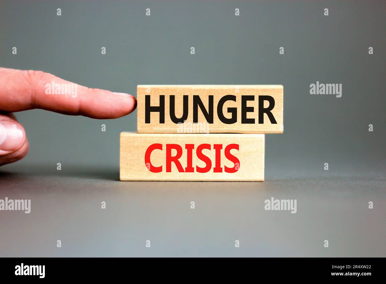 Hunger crisis symbol. Concept words Hunger crisis on wooden blocks on a ...
