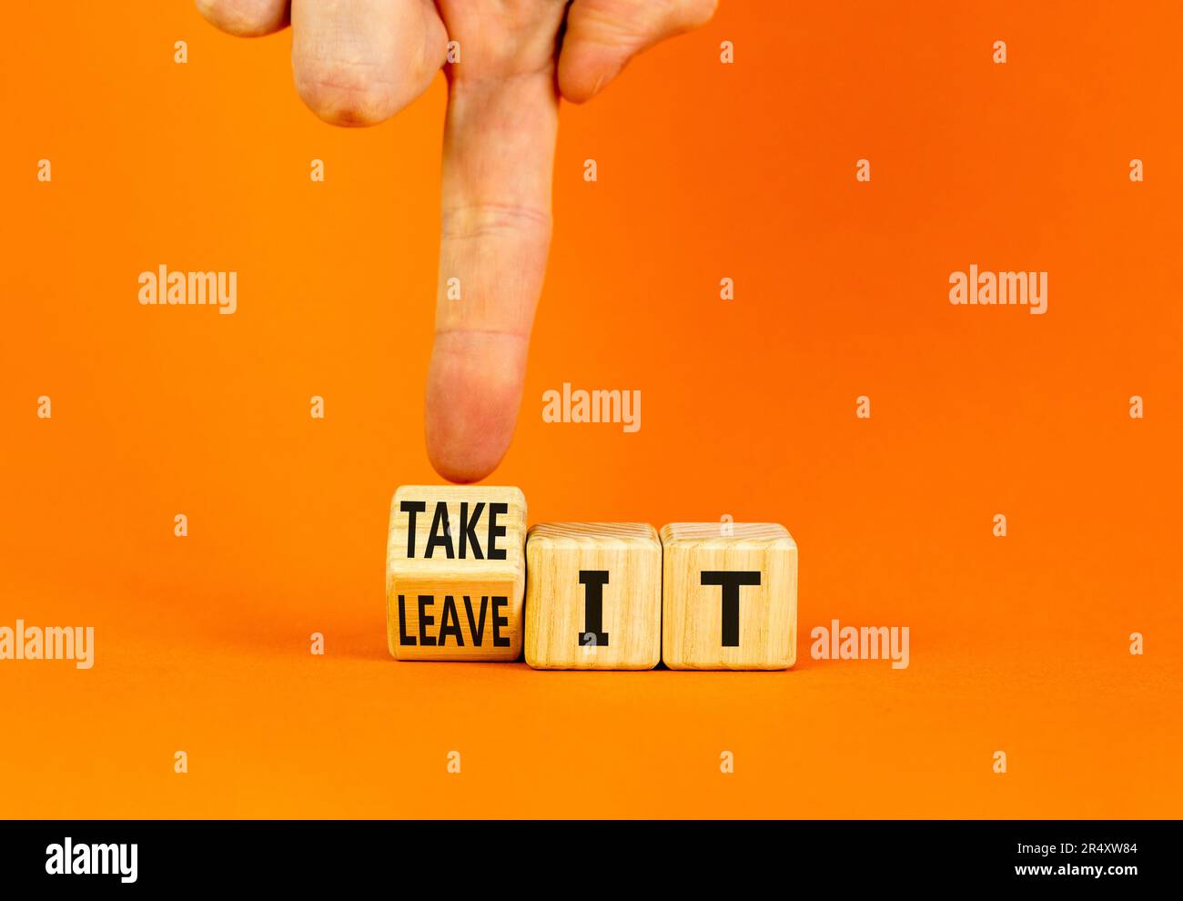 Take or leave it symbol. Businessman turns wooden cubes and changes ...