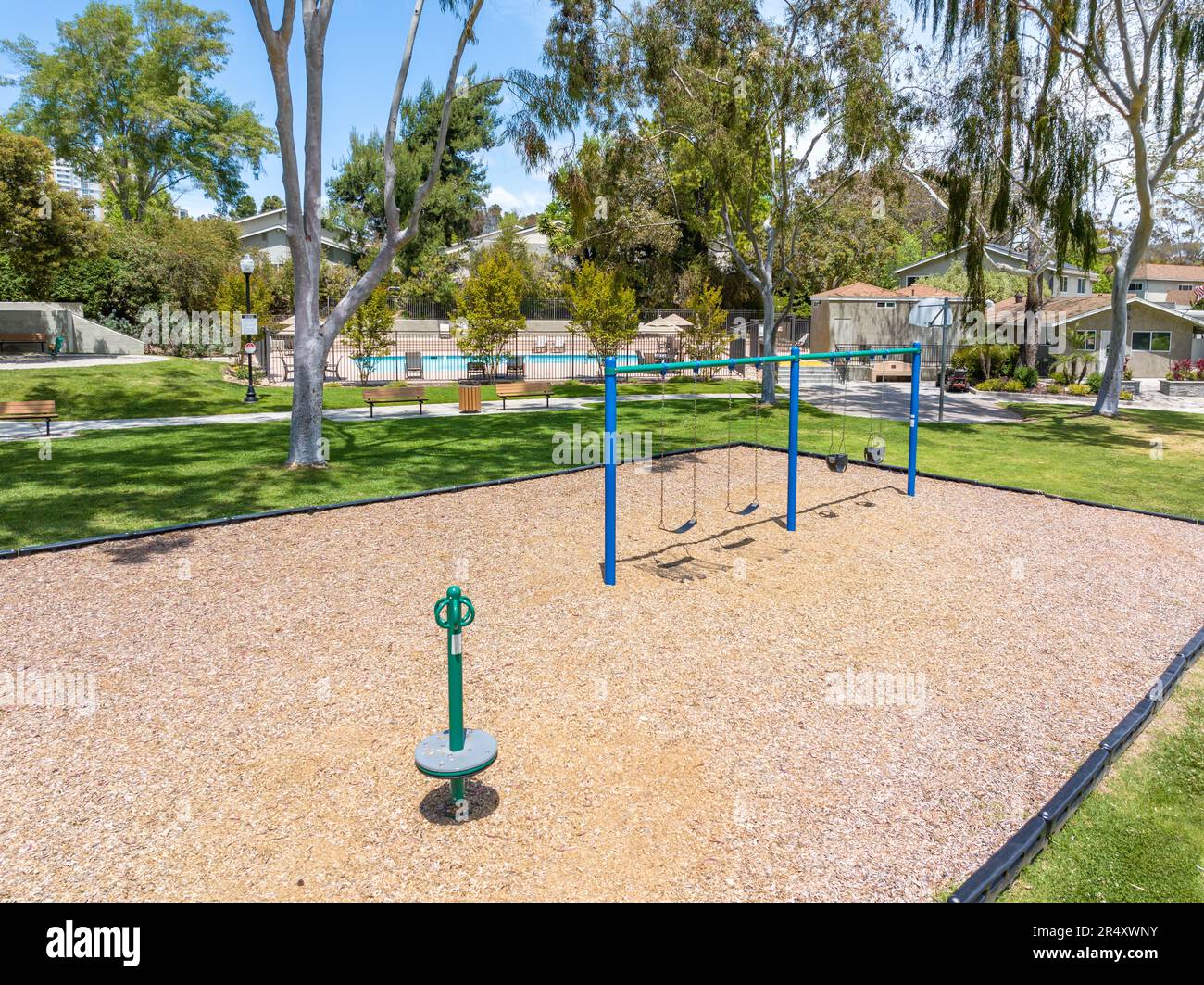 Aerial view of recreational facilities with kids playgorund in private ...
