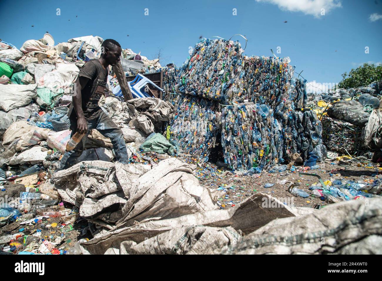 A worker is seen at a plastic recycling plant in Nakuru. Negotiators ...