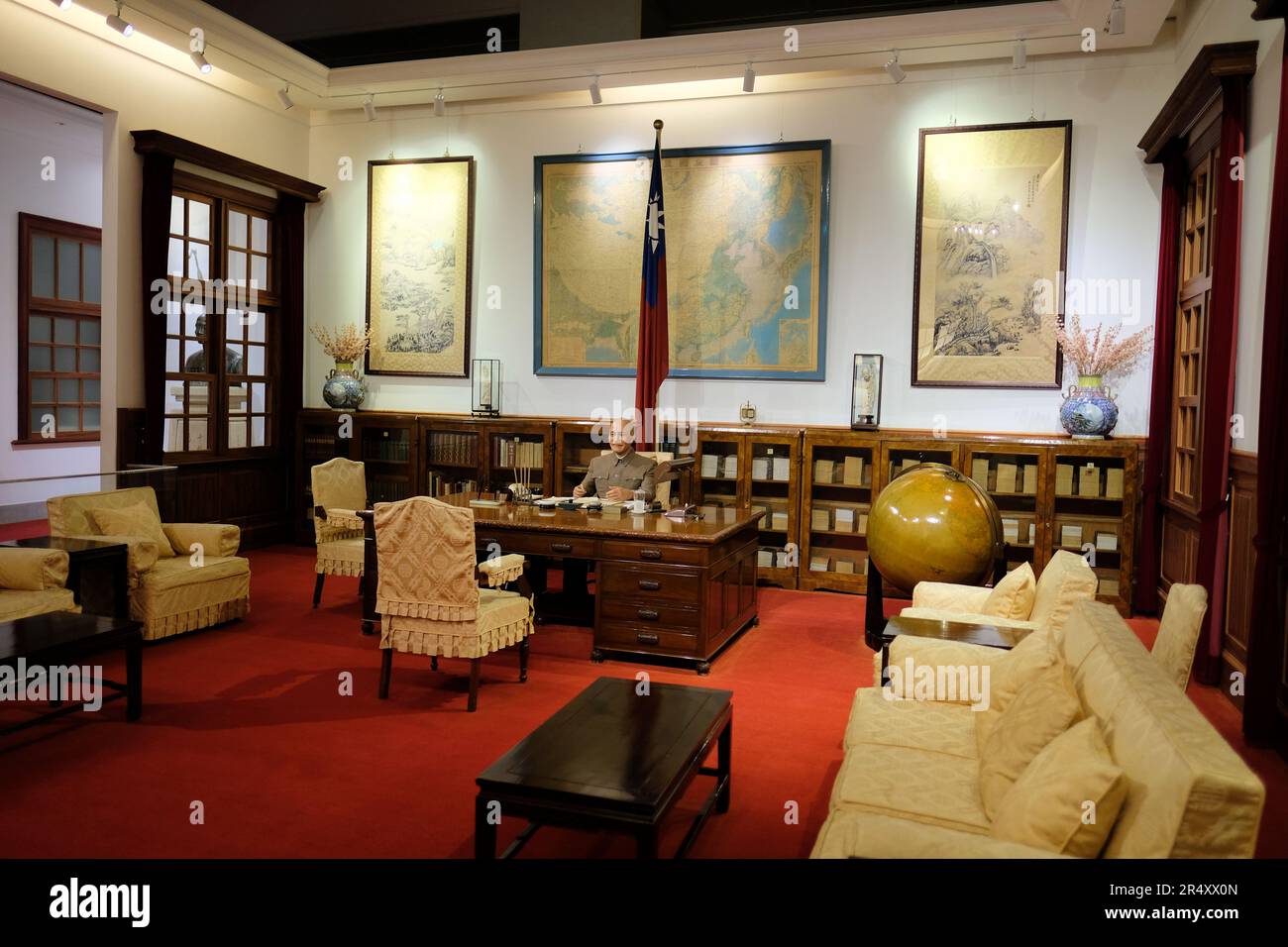 Seated Chiang Kai-Shek wax figure at his work desk in his reconstructed ...