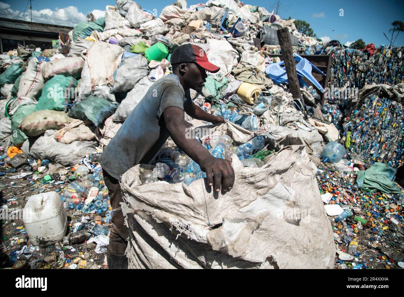 May 30, 2023, Nakuru, Kenya: Workers sort and put plastic bottles in a ...