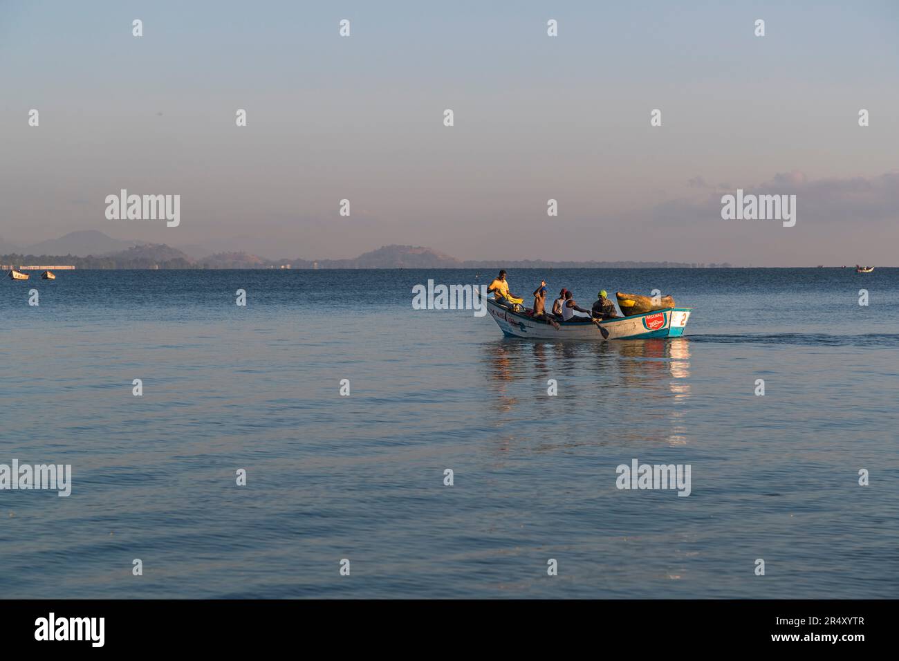 Lake Malawi, men on their way to a small fishing port near Makawa. The ...