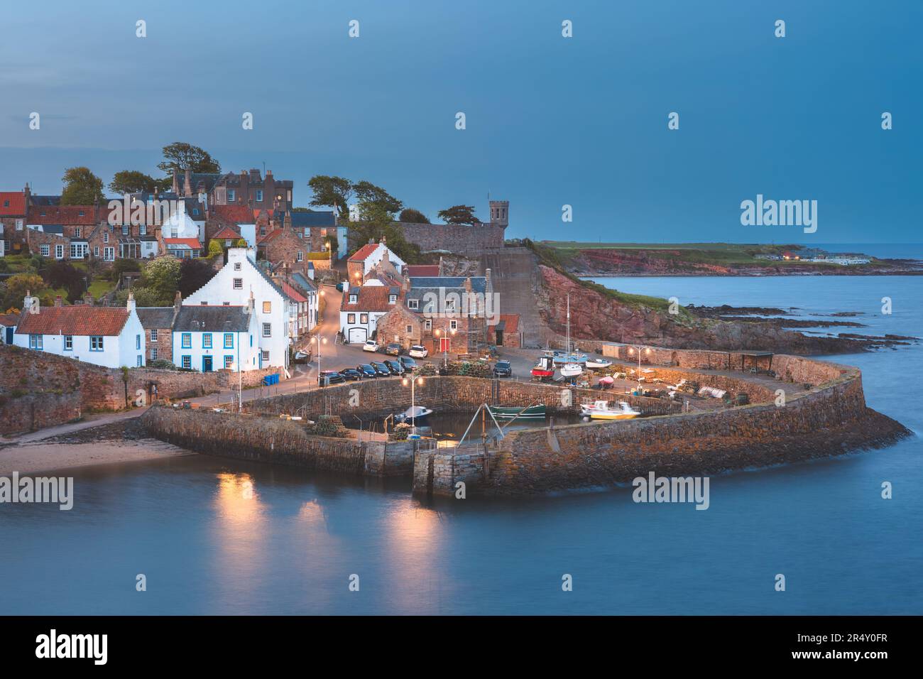 Scenic, picturesque sunset view of the charming coastal fishing village ...