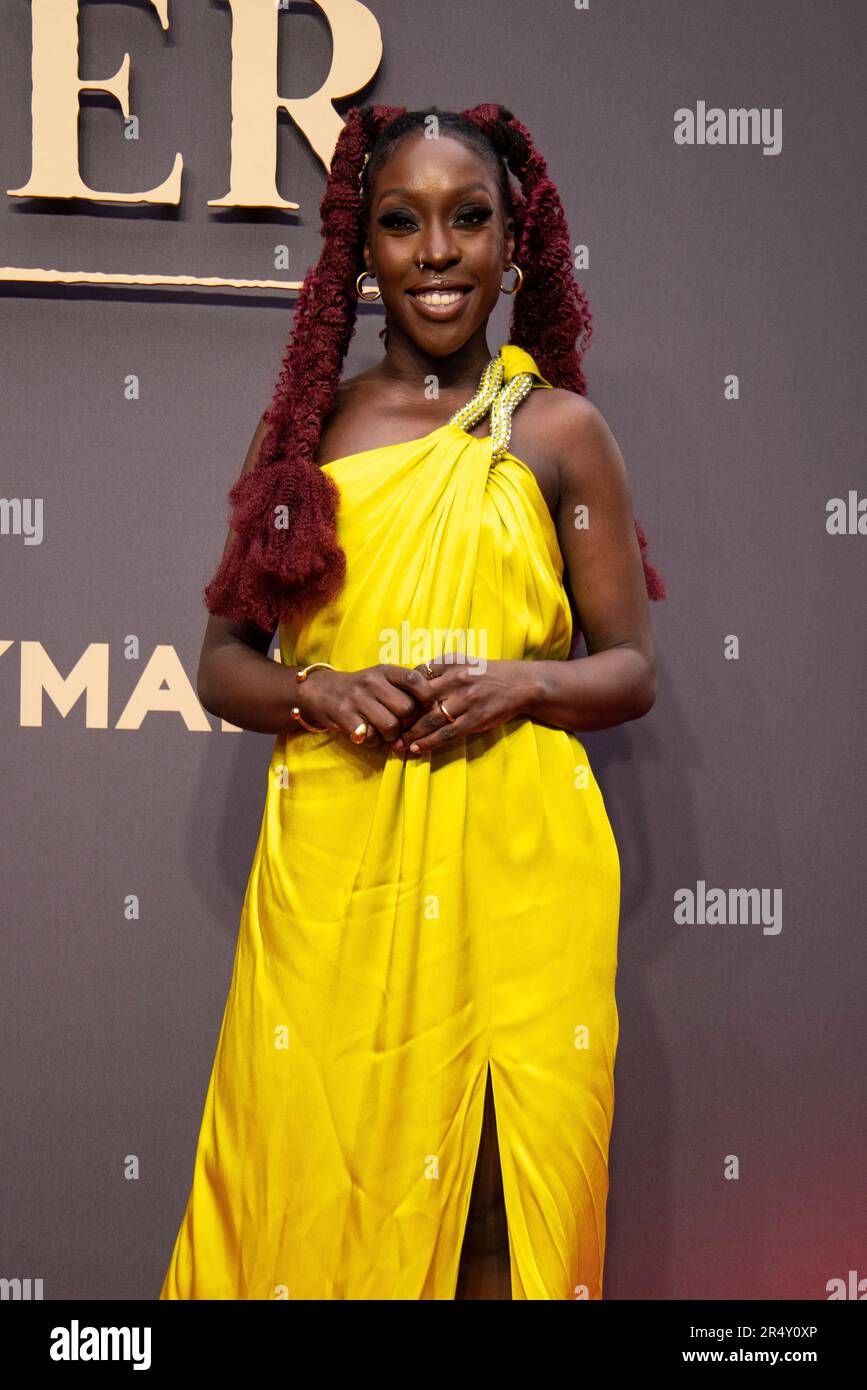 Ronke Adekoluejo poses for photographers upon arrival at the premiere ...
