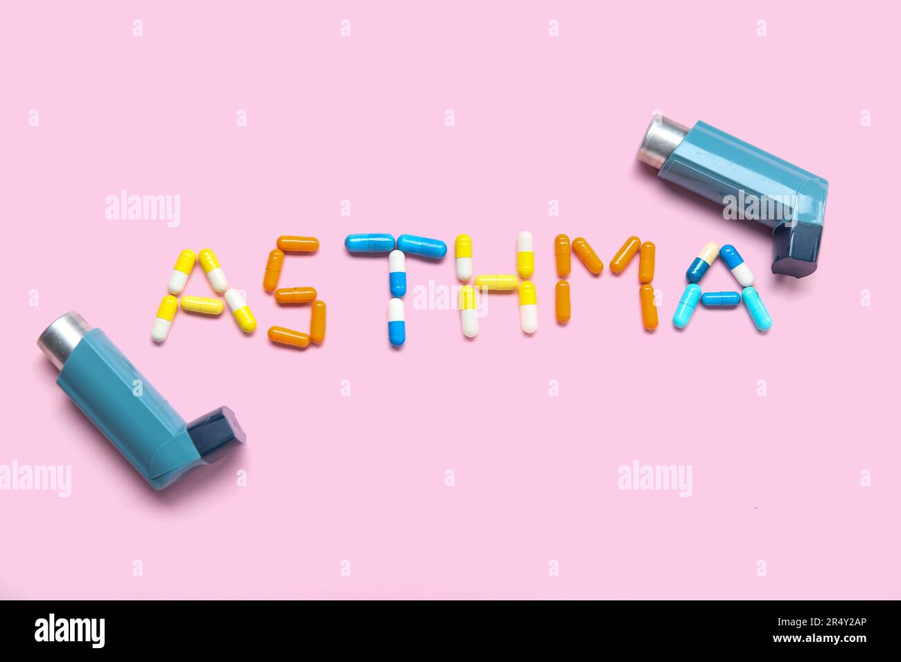 Word ASTHMA made of pills and inhalers on pink background Stock Photo ...