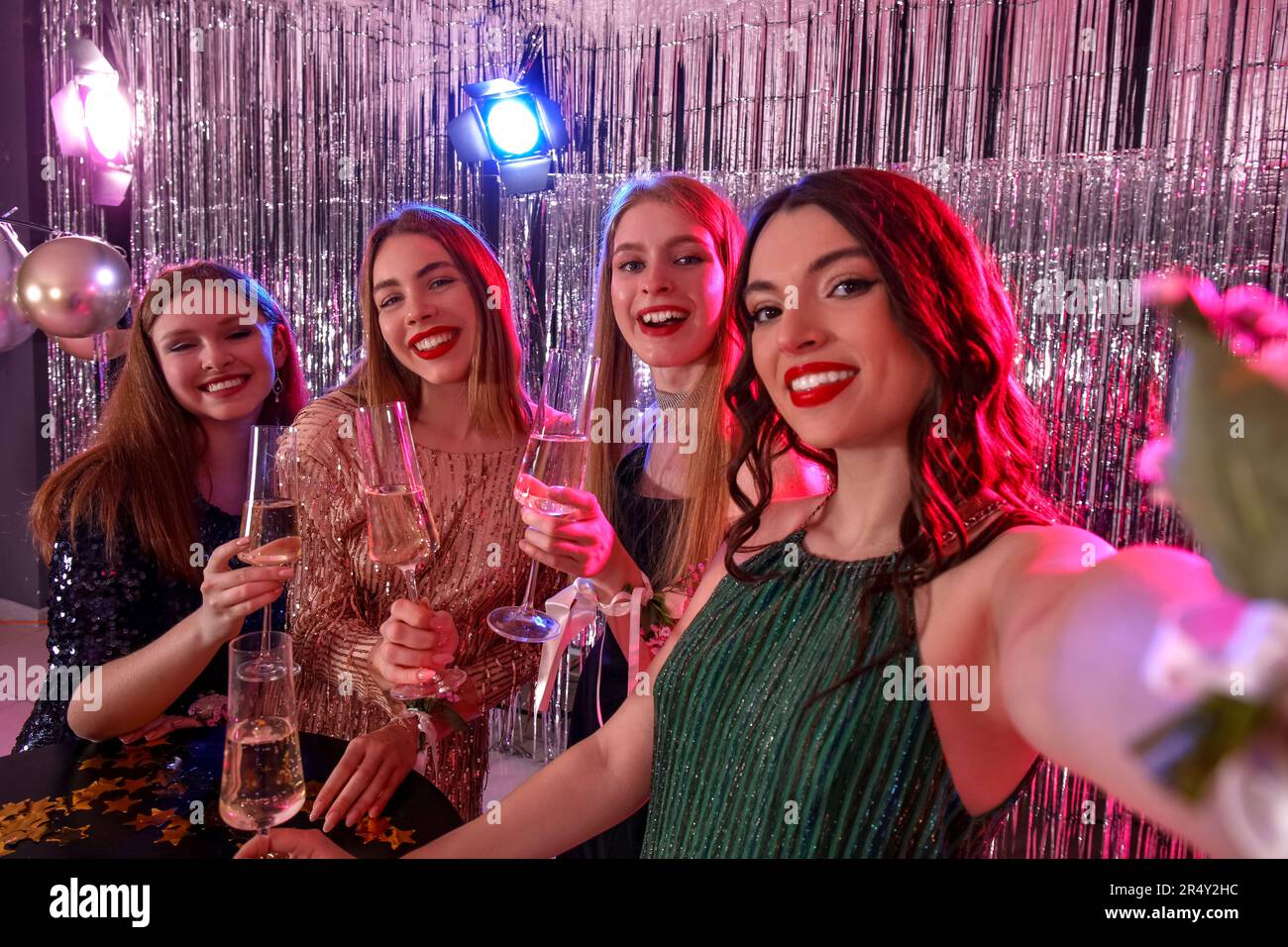 Young women drinking champagne on prom night Stock Photo - Alamy