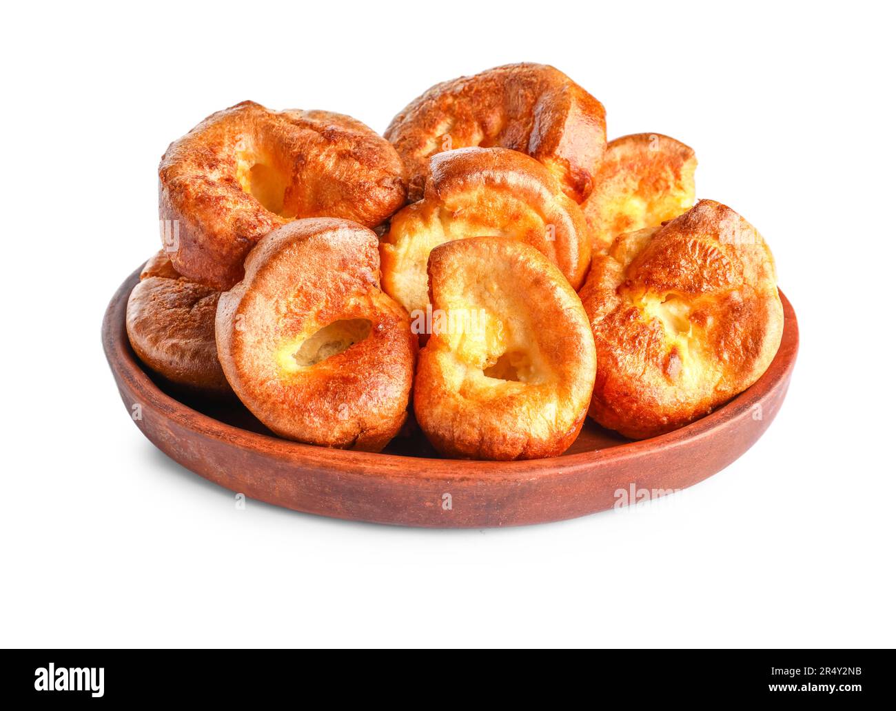 Plate with tasty Yorkshire pudding isolated on white background Stock ...