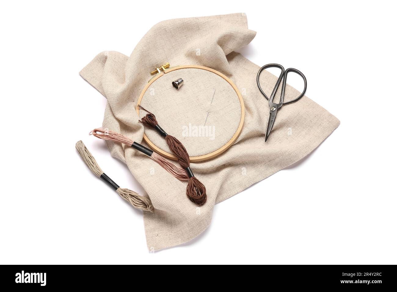 Embroidery hoop with canvas, scissors and mouline threads isolated on ...