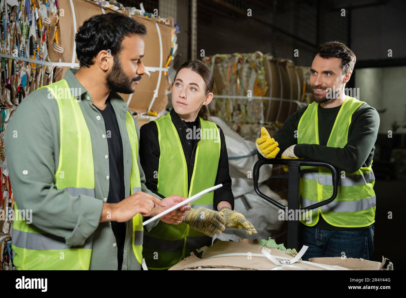 Garbage truck workers smiling hi-res stock photography and images - Alamy