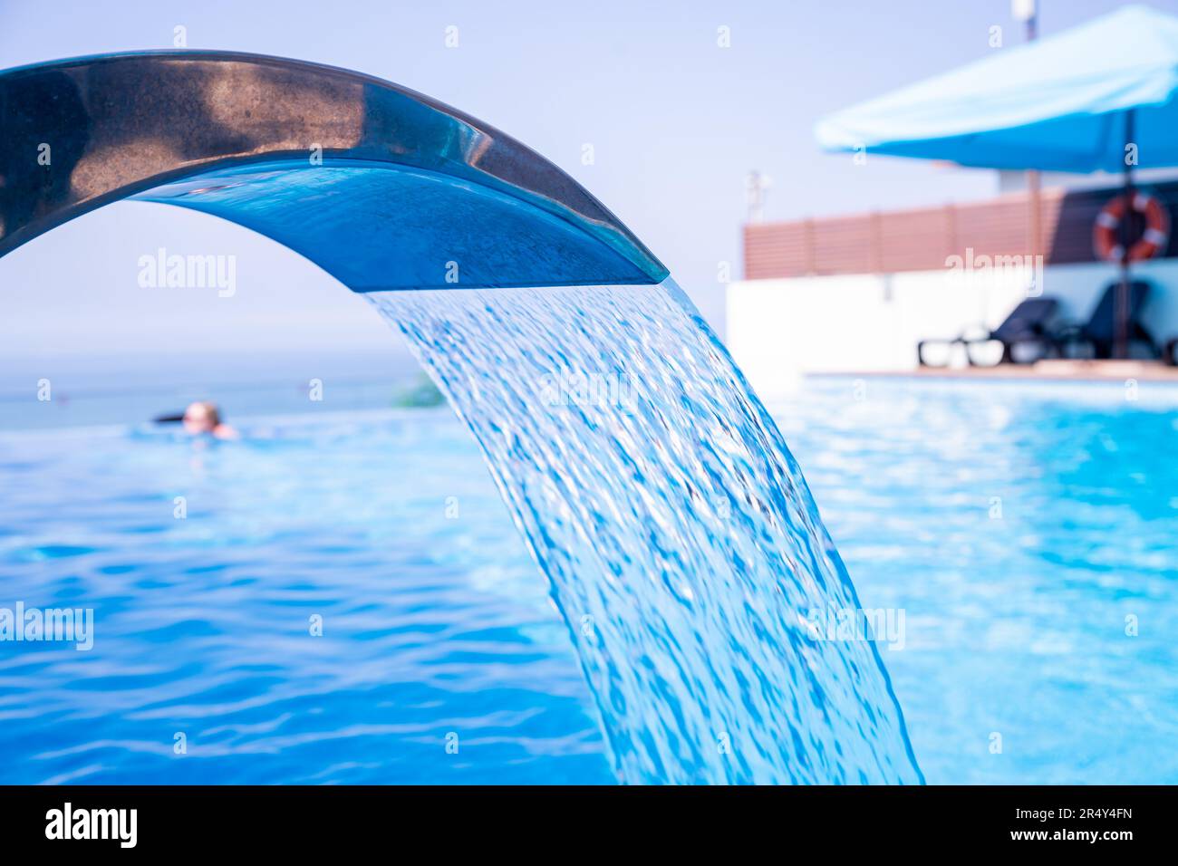 Empty Swimming pool with waterfall jet and jacuzzi in action Stock ...