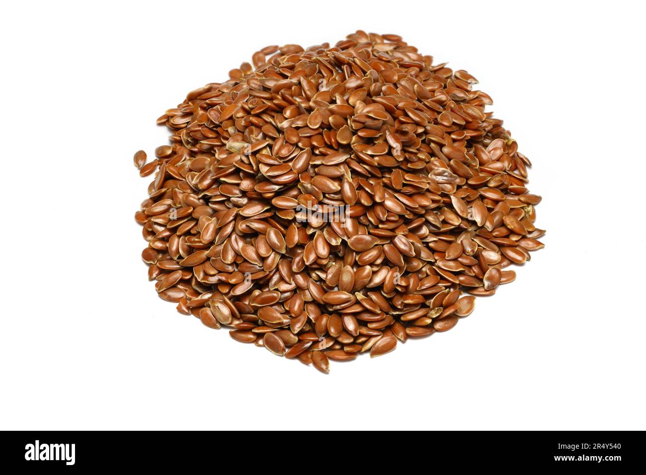 Pile of flax seeds isolated on white background Stock Photo - Alamy