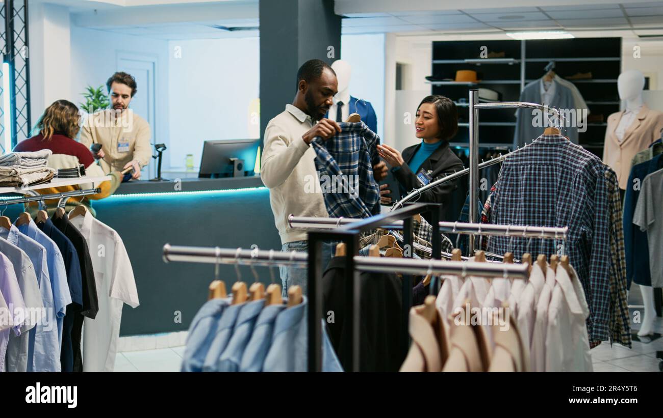 Male asian client clothing store hi-res stock photography and images ...