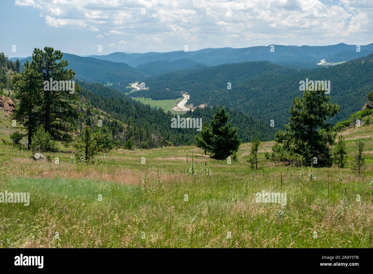 US Highway 285 winds its way up into the Rocky Mountains in this view ...