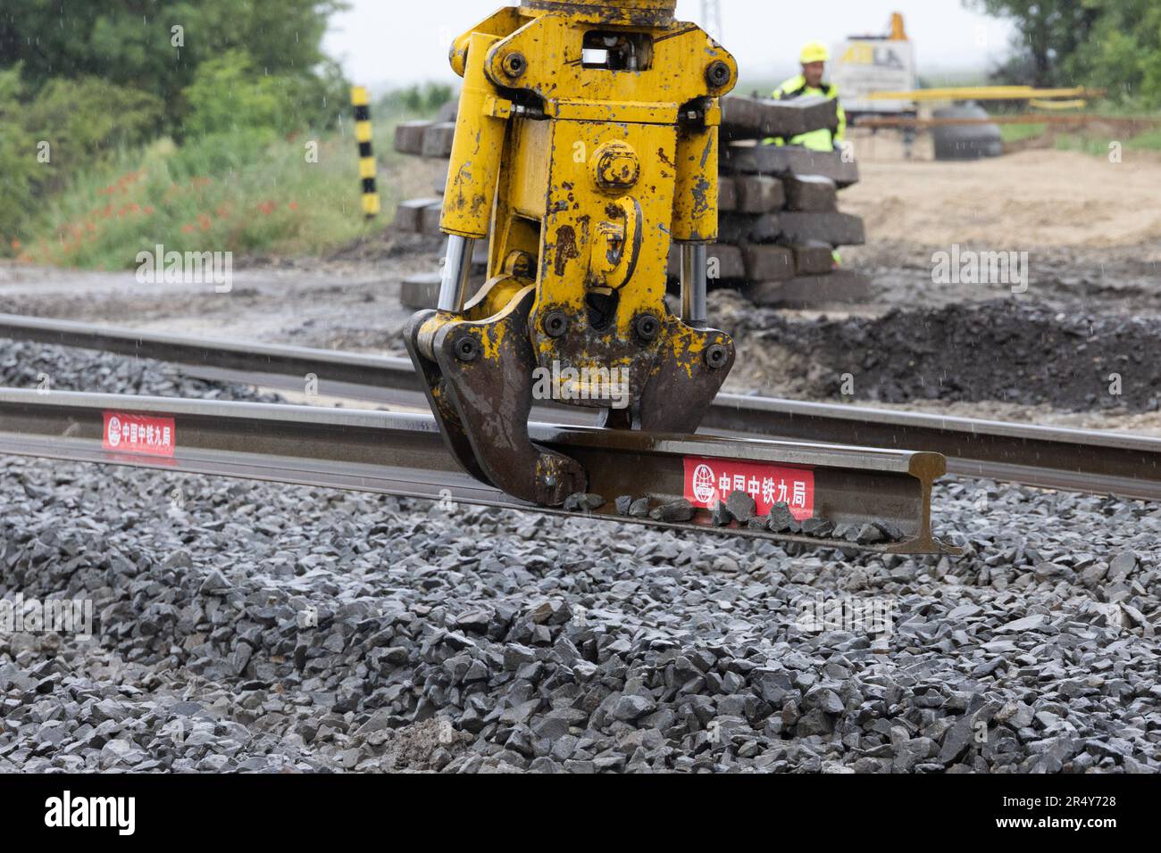 Kunszentmiklos, Hungary. 30th May, 2023. A machine lifts a steel rail ...
