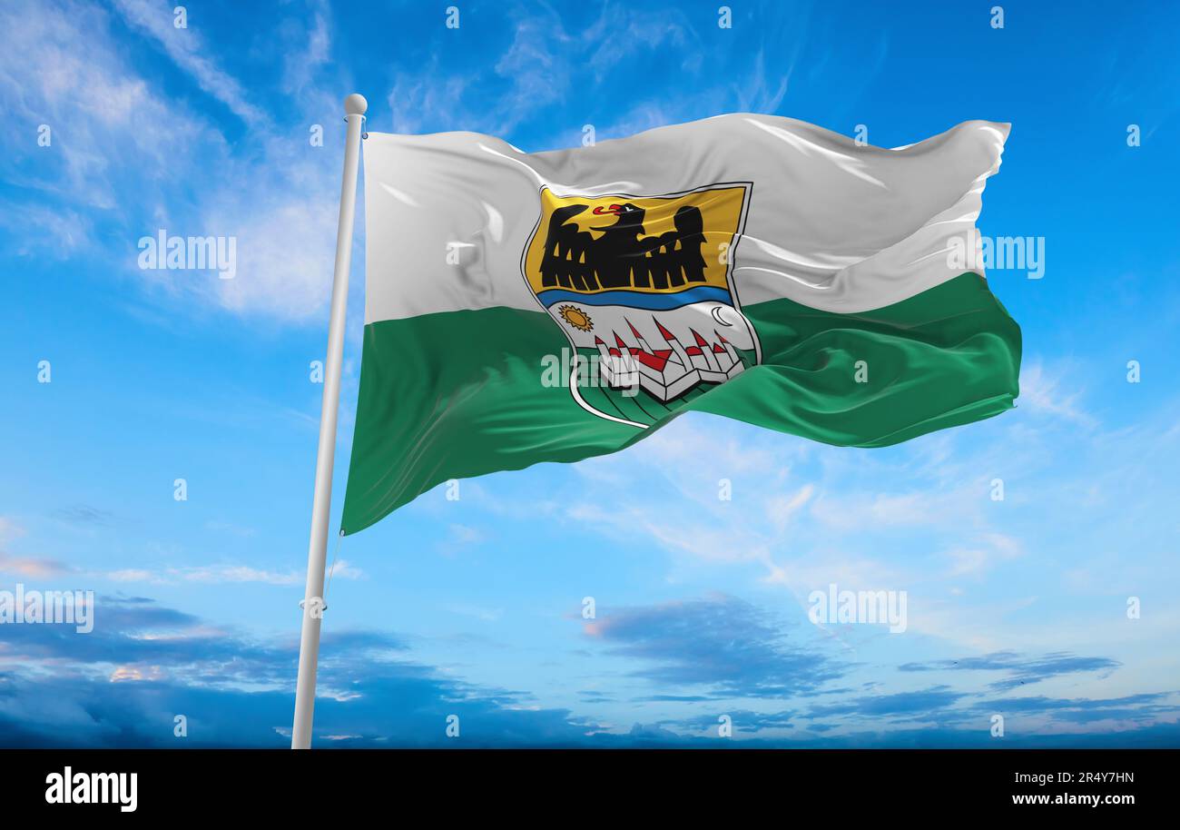 flag of German peoples Danube Swabians at cloudy sky background ...