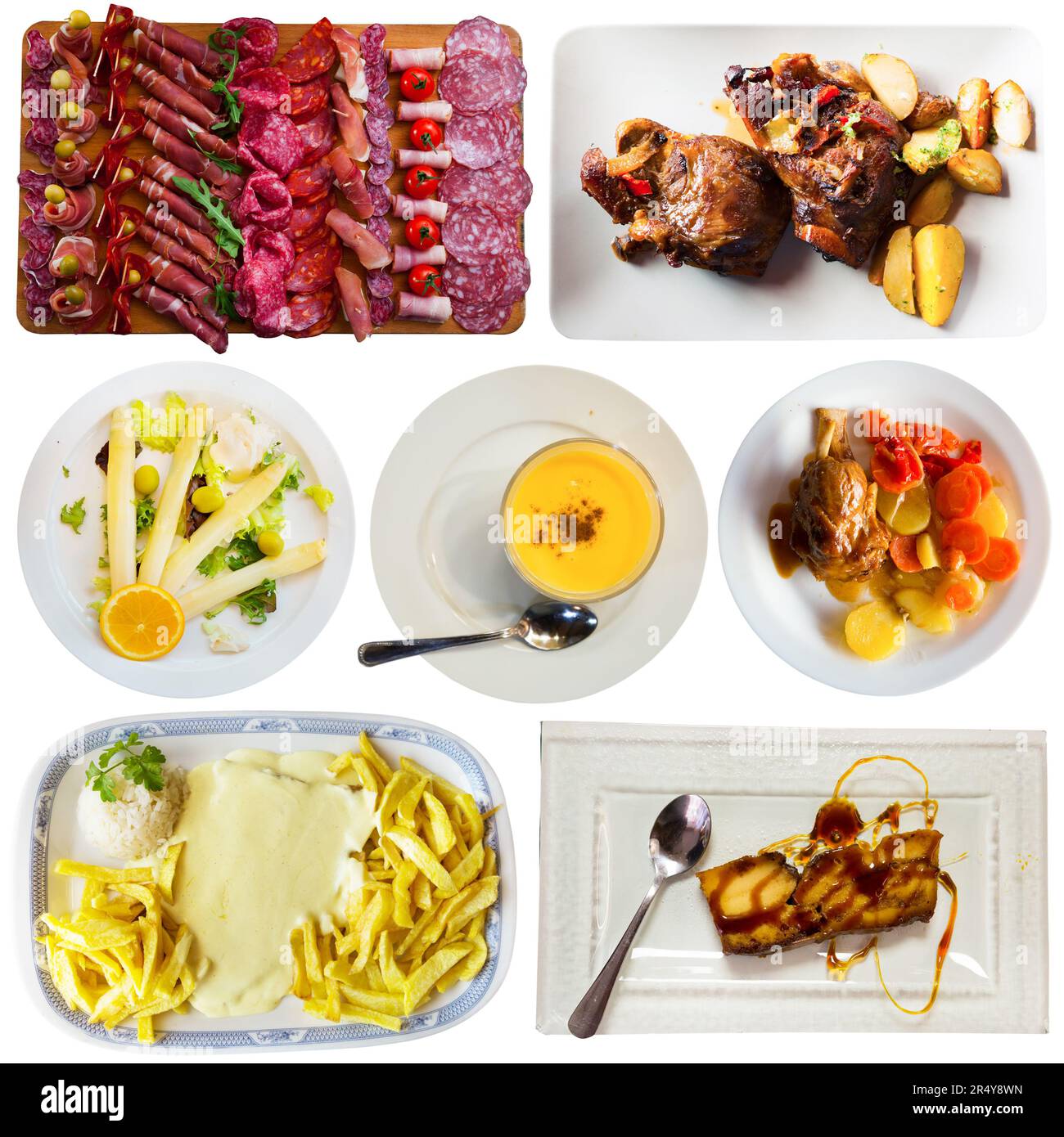 Spanish cuisine dishes at plates isolated on white background Stock ...