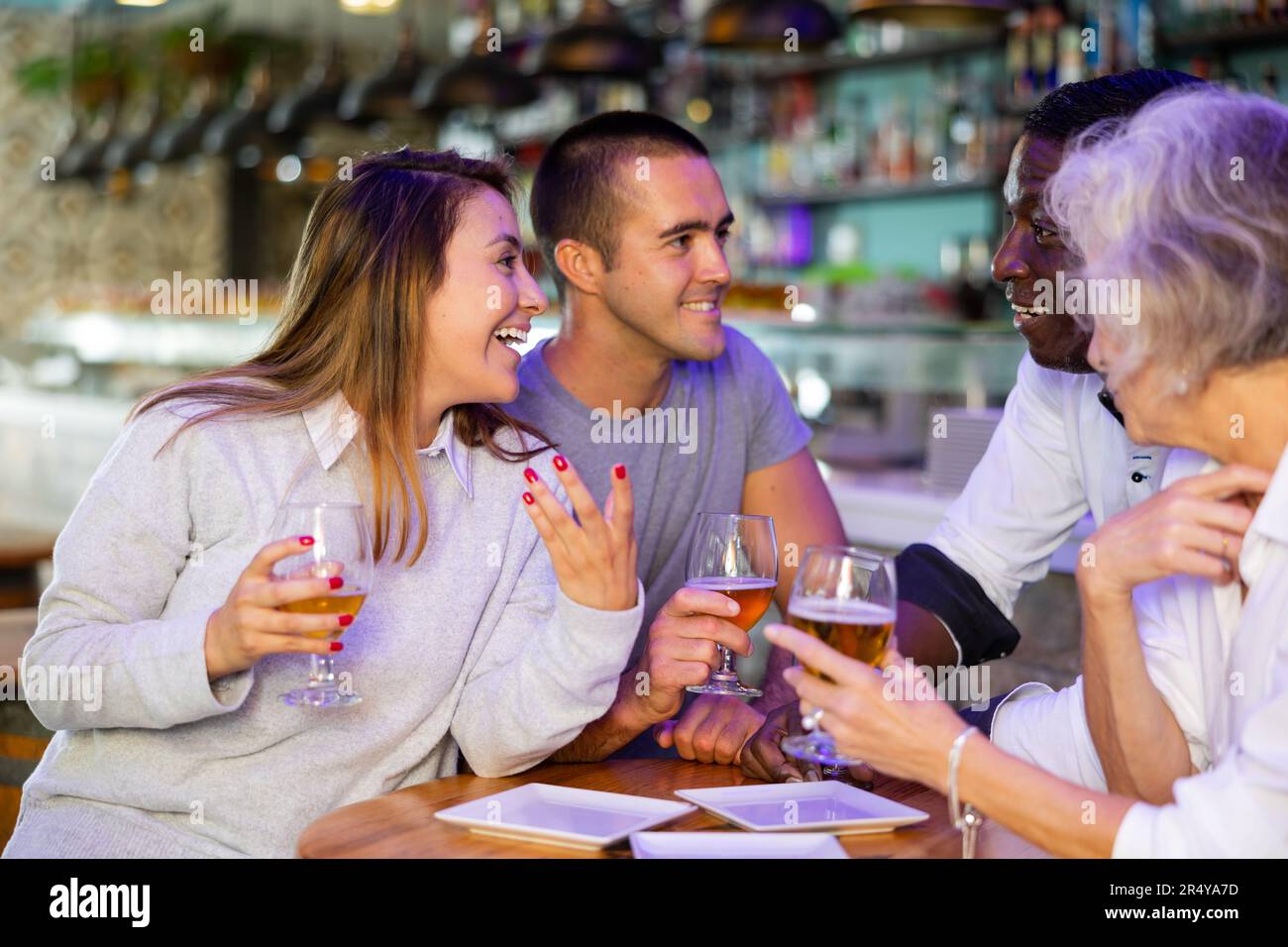 Positive delighted couple talking hi-res stock photography and images ...