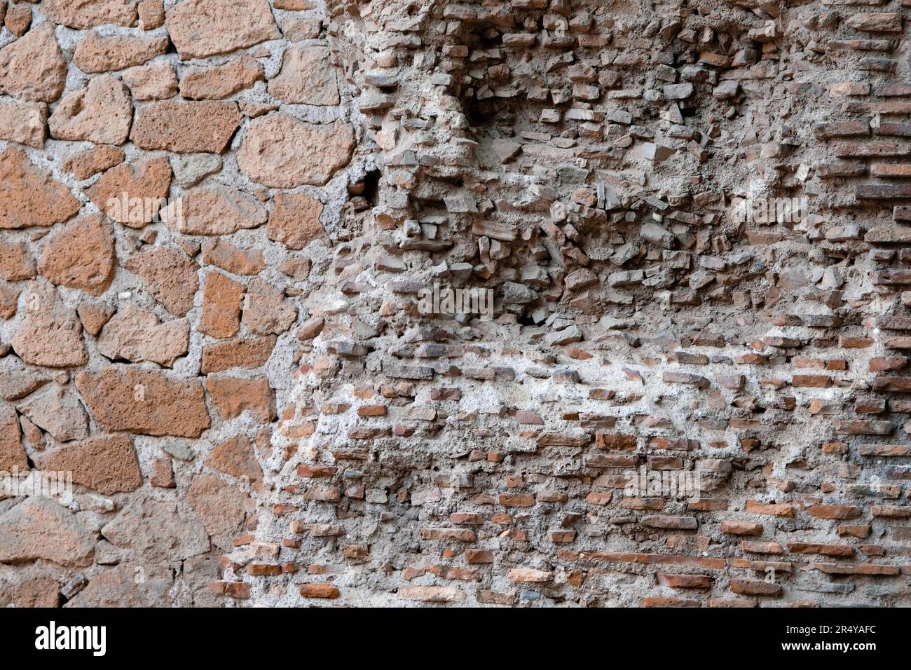 Collapsing brich surrounded by newer stone in Rome, Italy Stock Photo - Alamy
