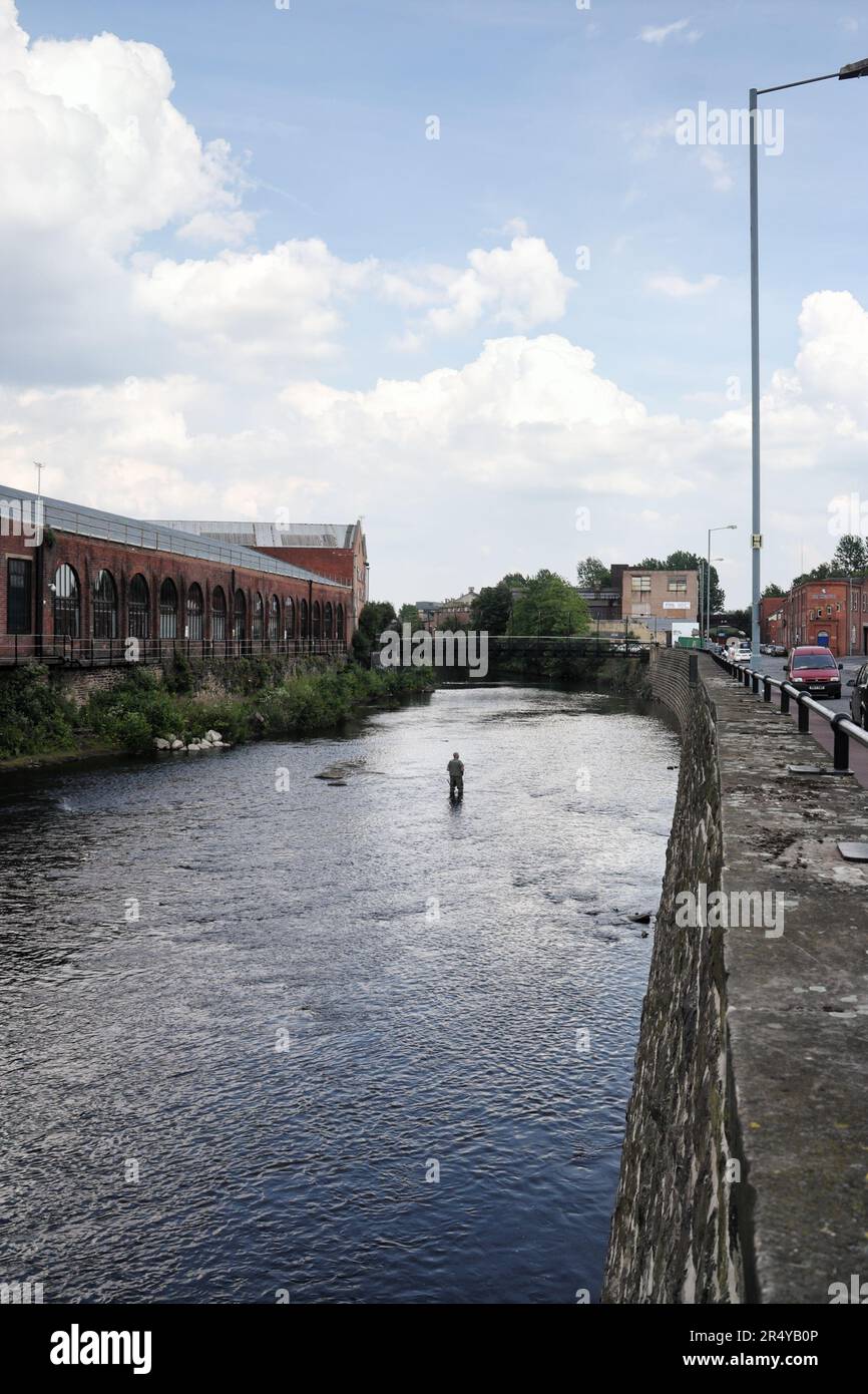 Lone angler fishing the river Don in Sheffield England UK Stock Photo ...