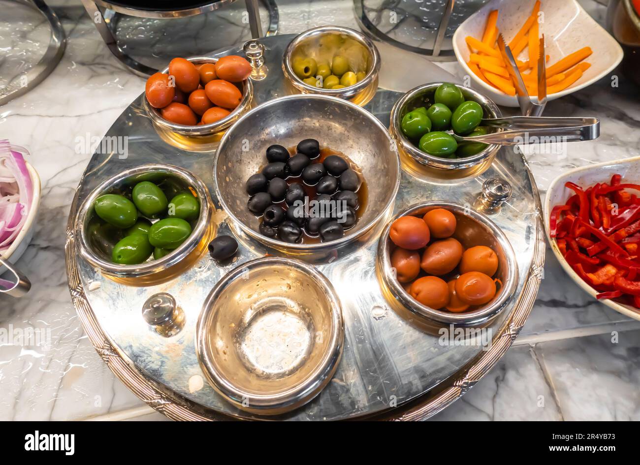 Various olives, olive in a bowl, assortment of olives served at the ...