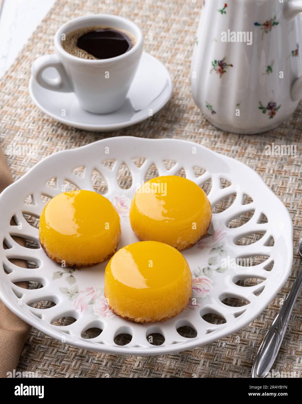 Quindim, traditional egg and coconut brazilian dessert with coffee ...