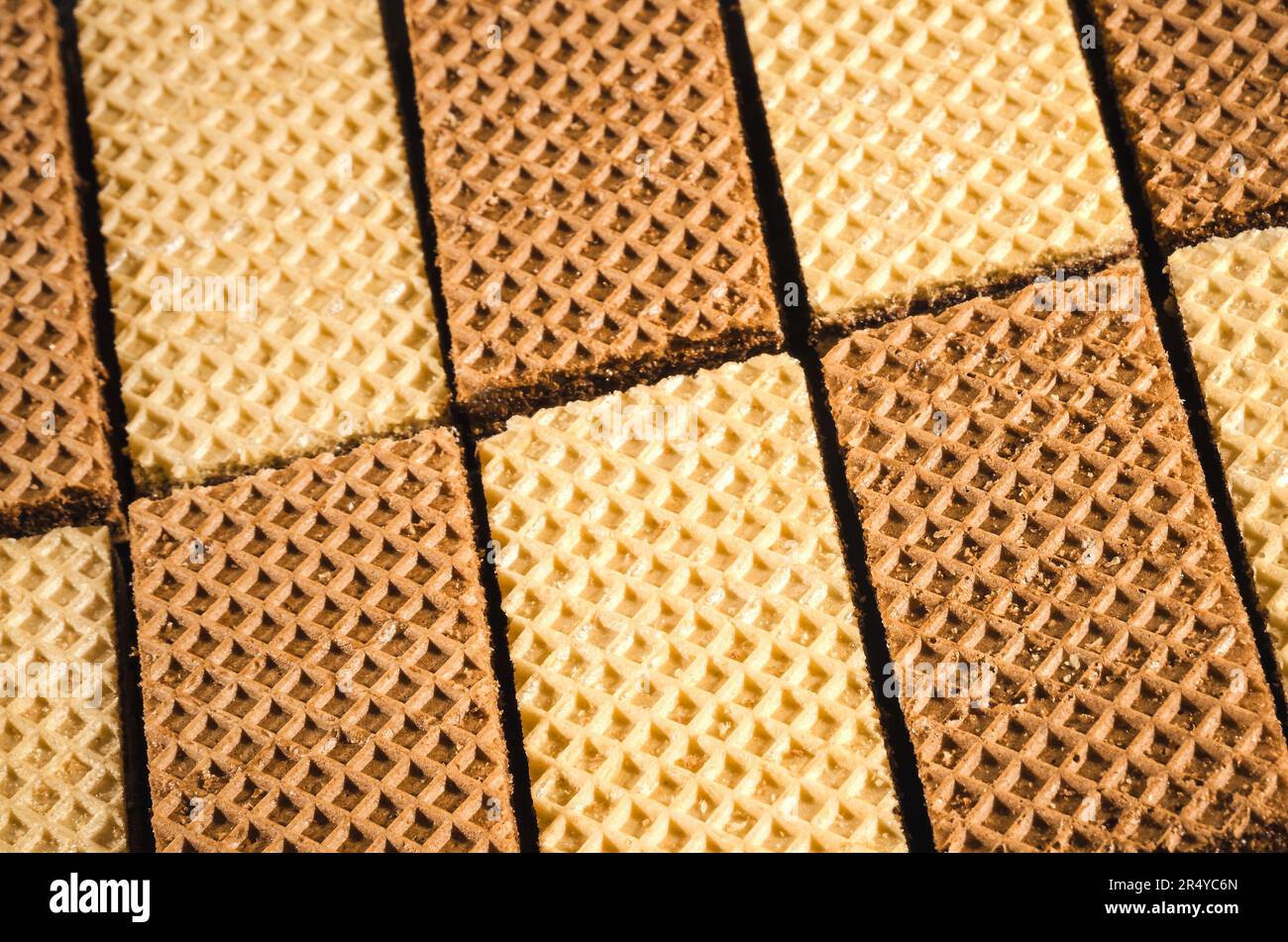 Background from cocoa wafers. Sweet mix of light and dark wafers Stock ...