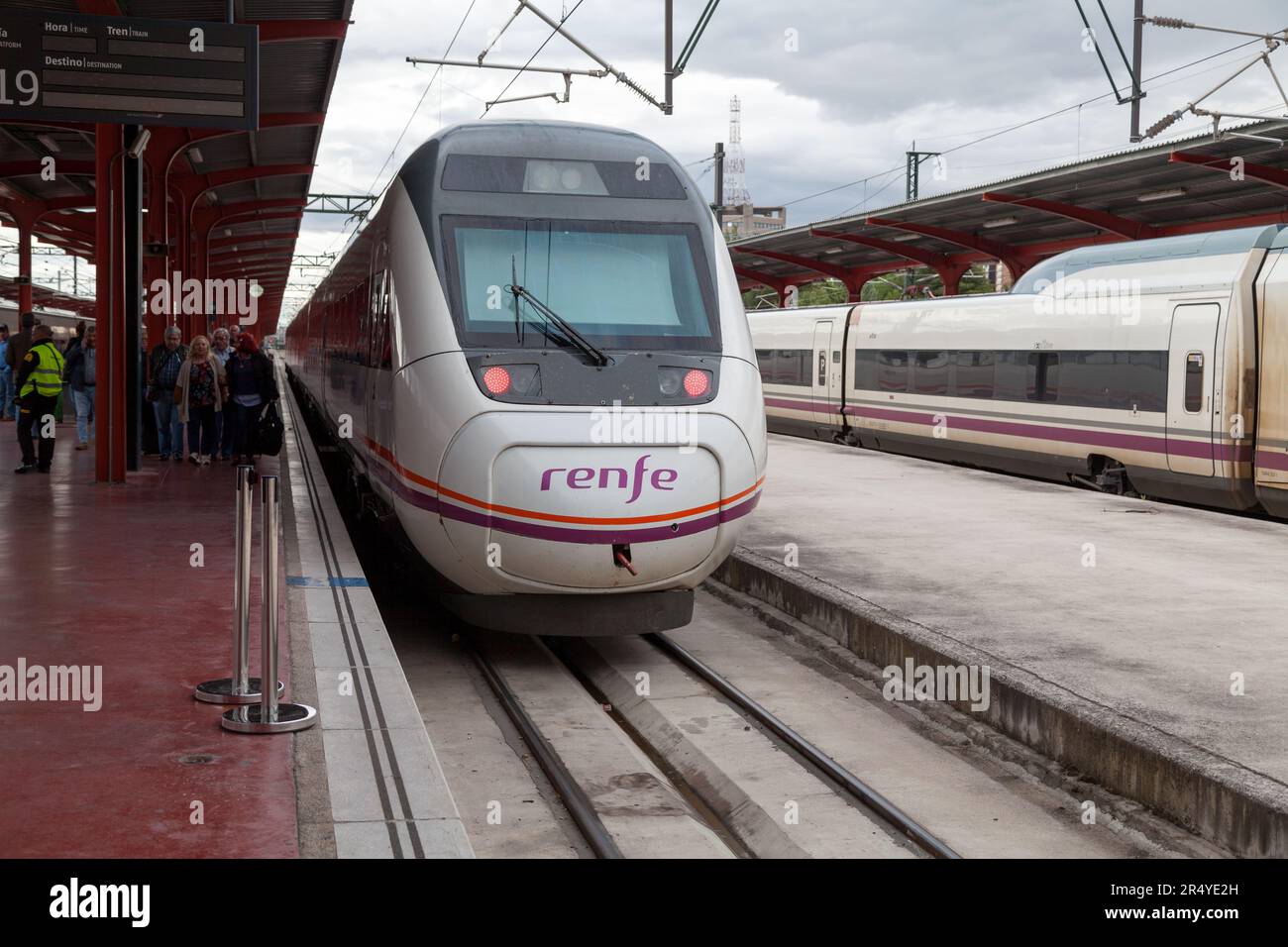 Madrid, Spain - June 05 2018: Travelers leaving their train operated by ...