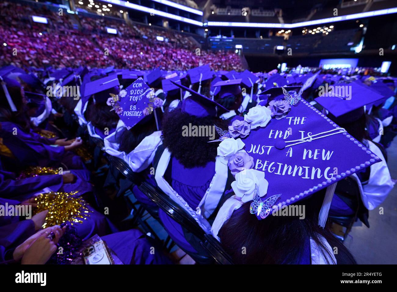 New York, USA. 30th May, 2023. A decorated cap is worn by a graduating ...
