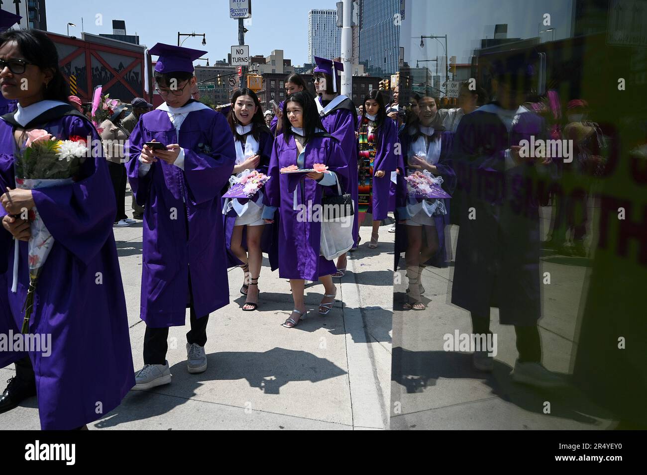 New York, USA. 30th May, 2023. Graduating students seen wearing caps ...