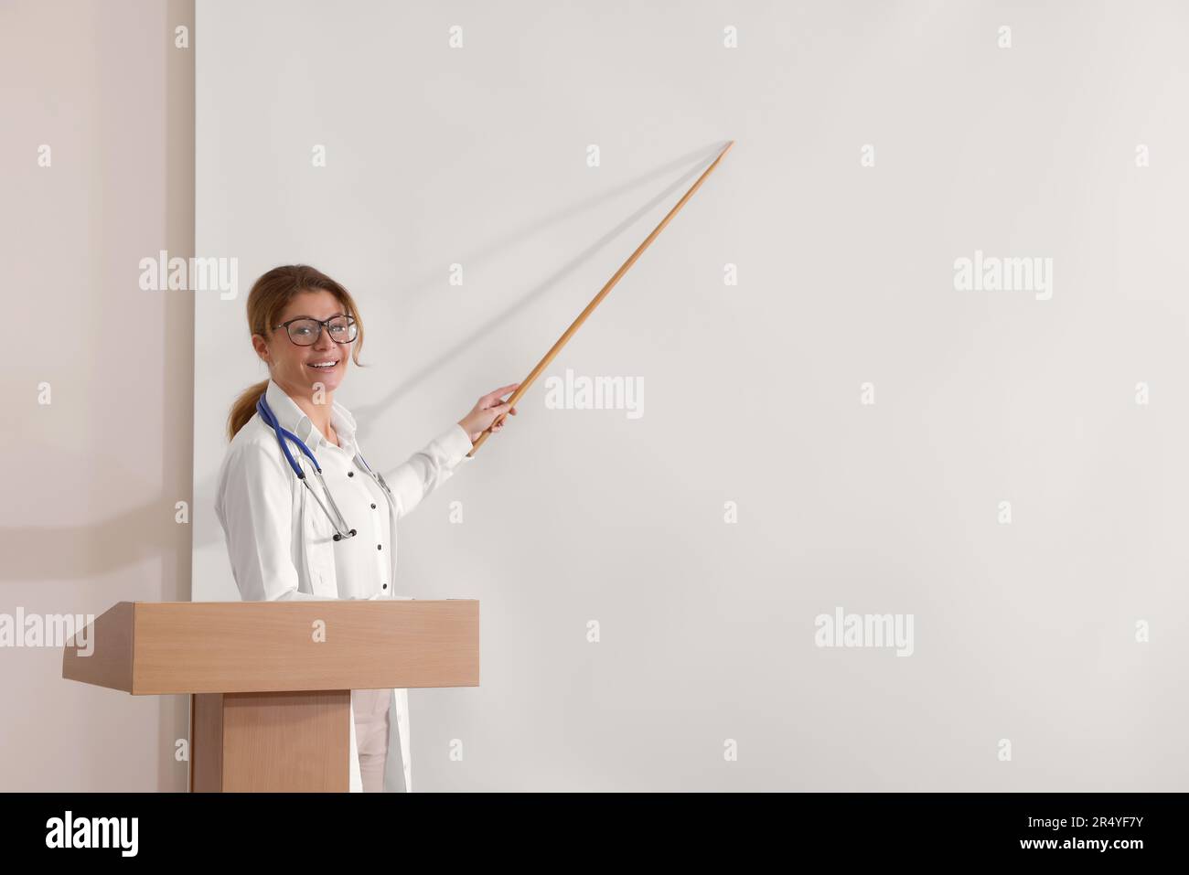 Female doctor giving presentation in hi-res stock photography and ...