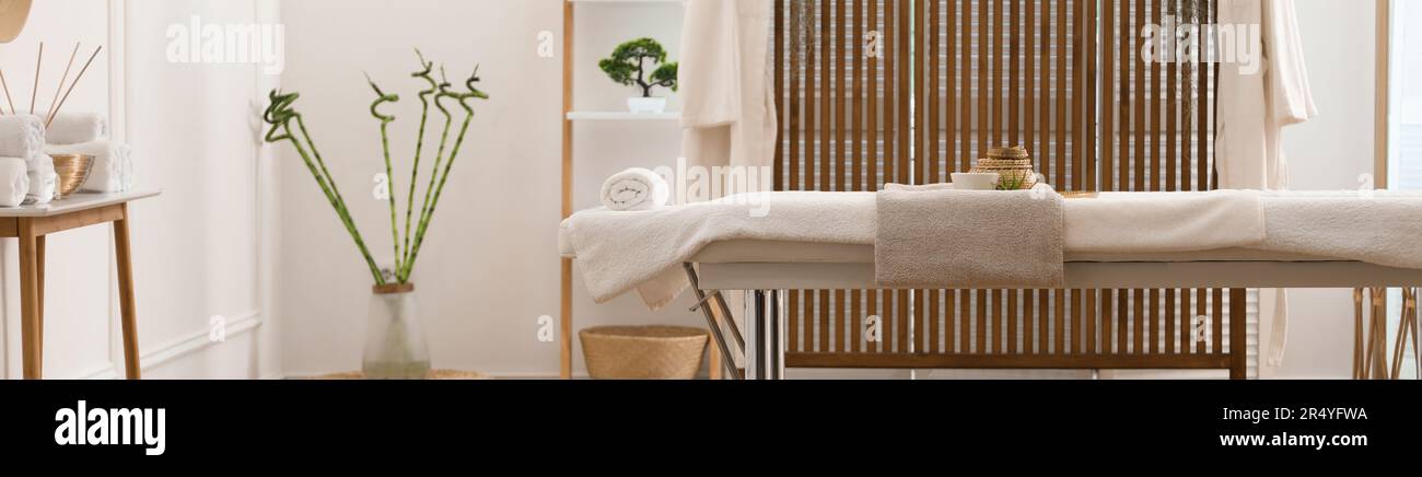 Spa cabinet interior with massage table in wellness center. Banner ...