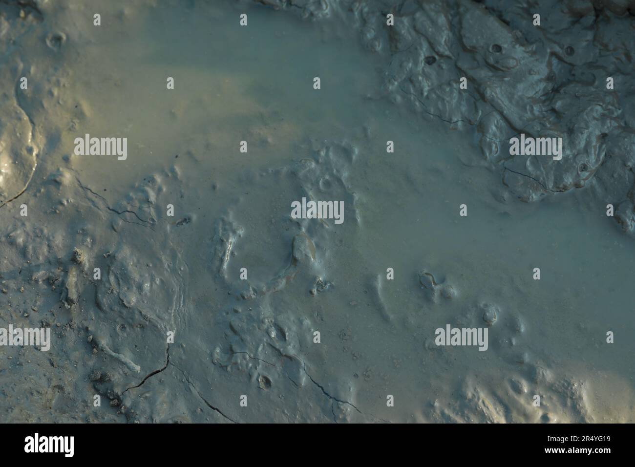 Ground mud as background, view from above Stock Photo - Alamy