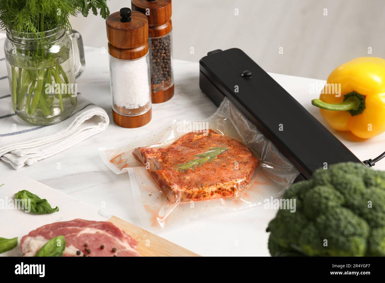 Raw meat wrapped in plastic hi-res stock photography and images - Alamy