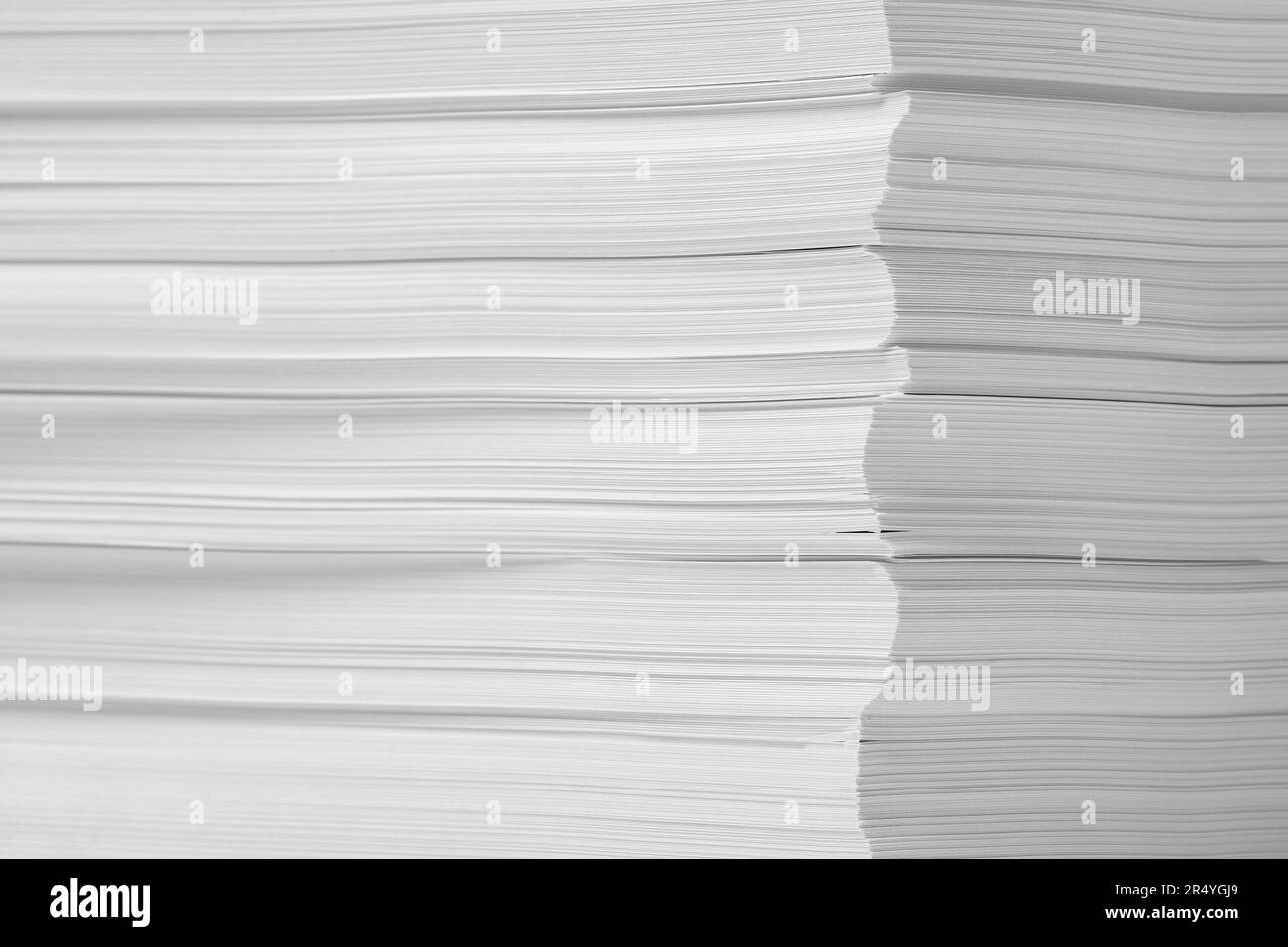 Stack recycled white paper paper Black and White Stock Photos & Images ...