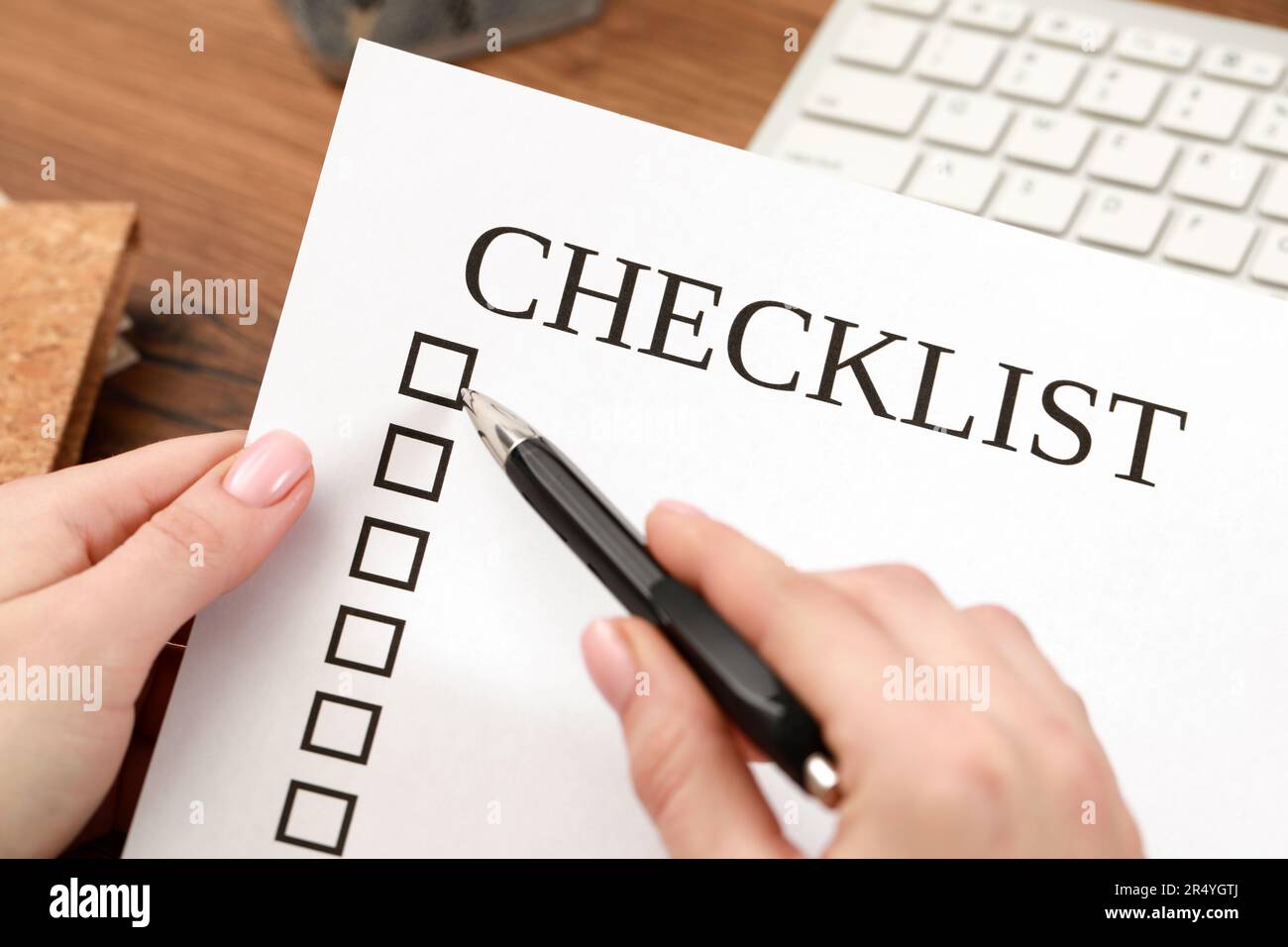 Woman filling checklist table hi-res stock photography and images - Alamy