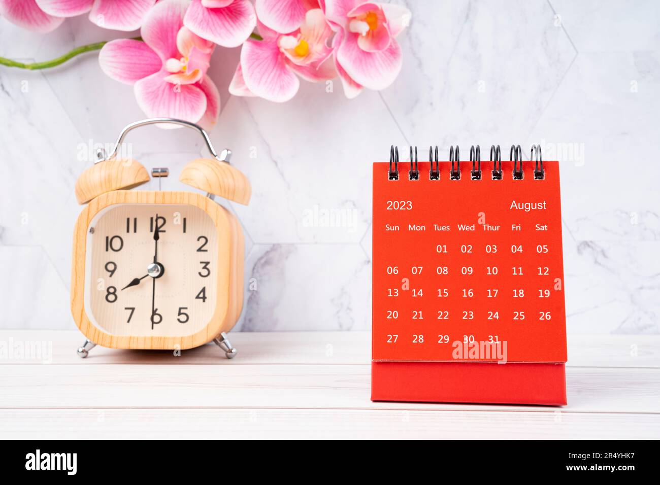 Red calendar August 2023. Desk calendar for year 2023 and pink orchid ...