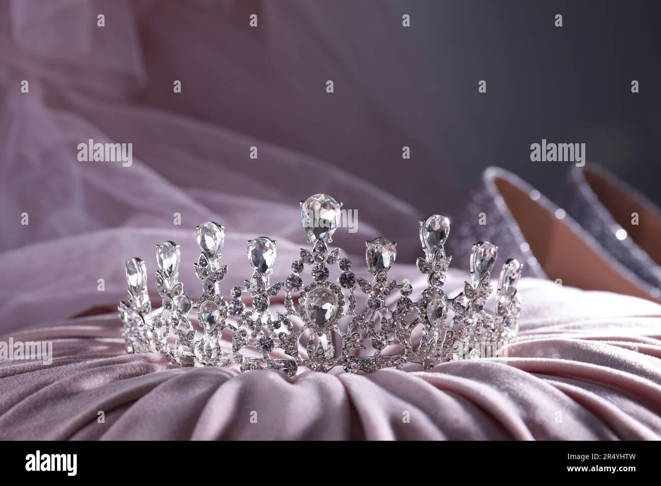 Beautiful silver tiara with diamonds on light cloth Stock Photo - Alamy