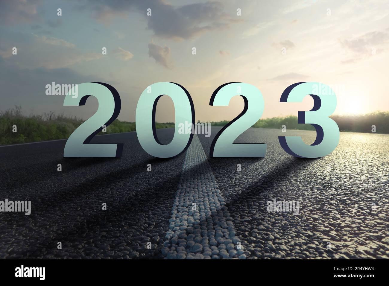 Start of new 2023 year. Numbers on asphalt road during sunrise Stock ...