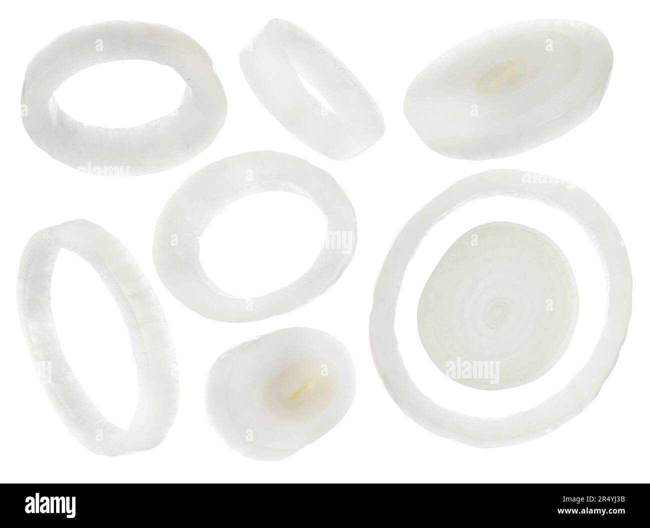 Fresh raw onion rings falling on white background Stock Photo - Alamy