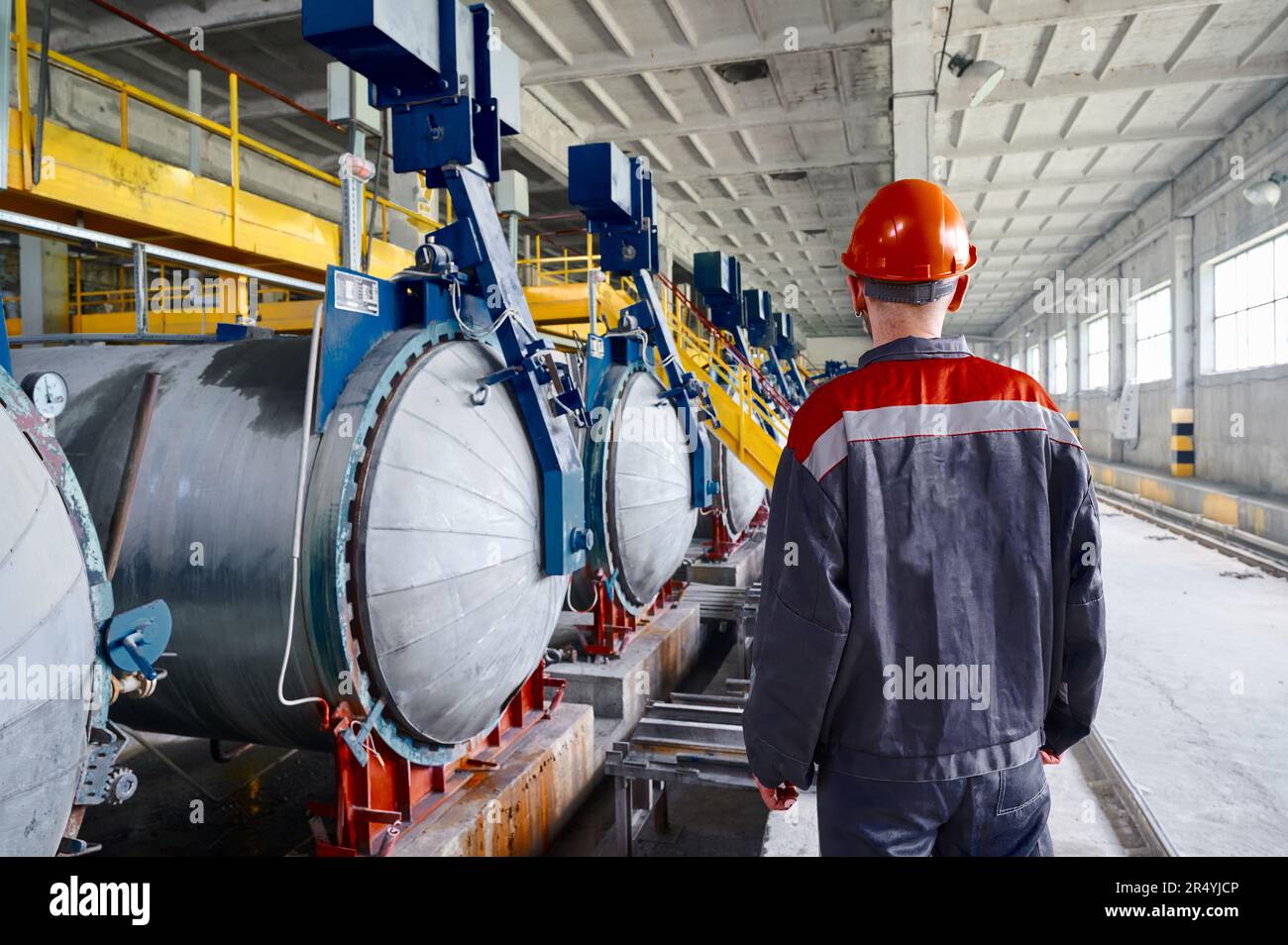 Autoclave workshop with tanks for silica blocks hardening Stock Photo ...
