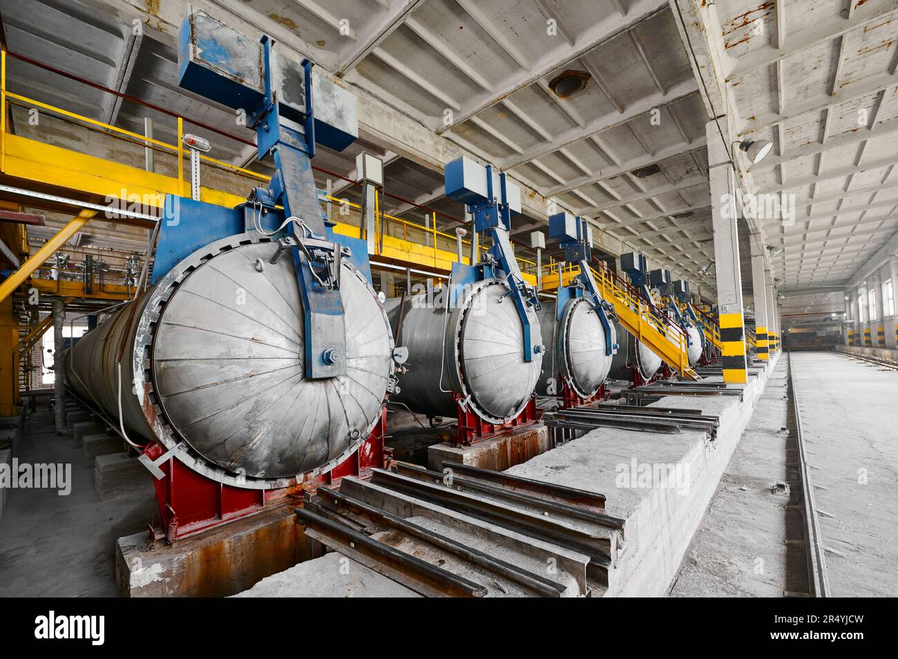 Autoclave workshop with tanks for silica blocks hardening Stock Photo ...